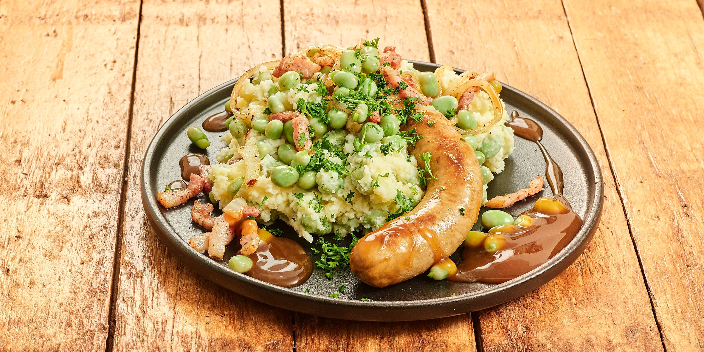 Gebraden worst met stamppot tuinbonen | Uitgekookt