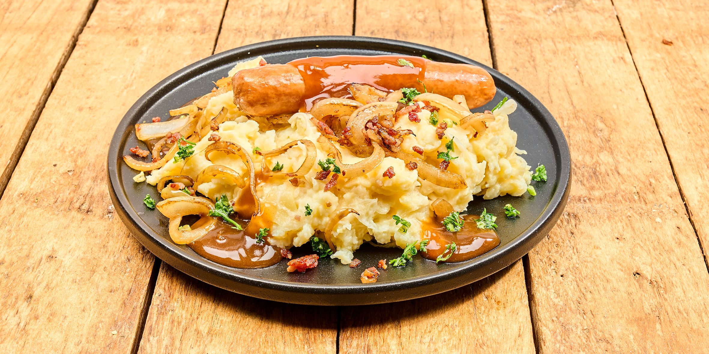 Stamppot zuurkool met rookworst en jus | Uitgekookt