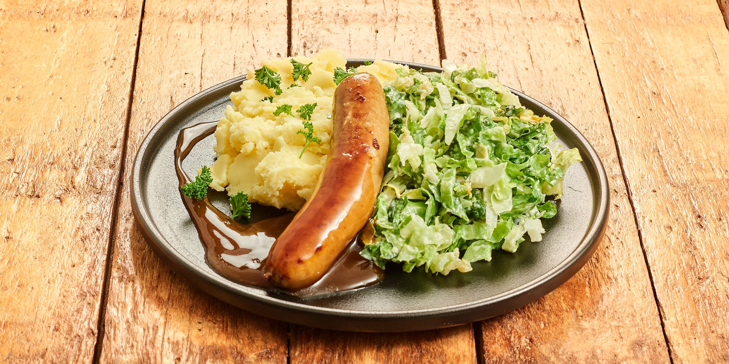 Gebraden worst met andijvie en aardappelpuree | Uitgekookt